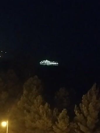 cruise ship lit up at night in Tanger, Morocco | Collective Memory